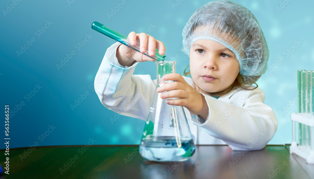 Little kid doing experiments with blue liquid. Cute child wants to ...