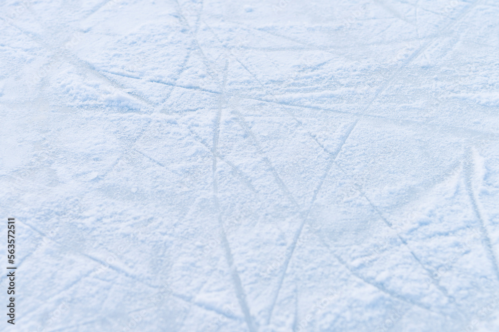 ice texture close up. Skating rink covered with snow. Skate tracks in ...