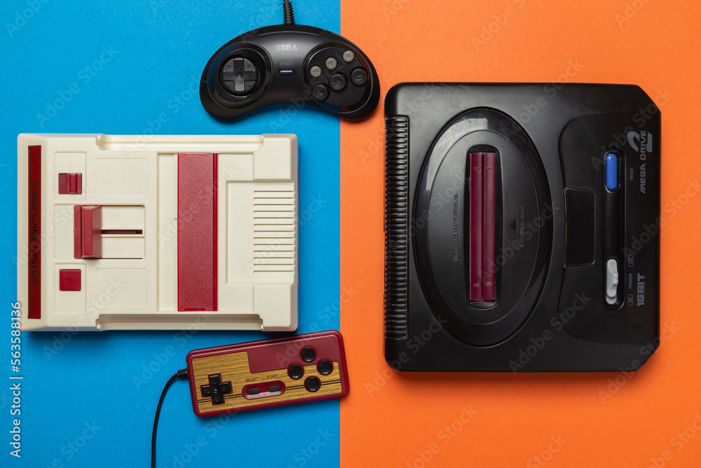 8-Bit and 16-bit Game Consoles With Gamepad foto de Stock | Adobe Stock