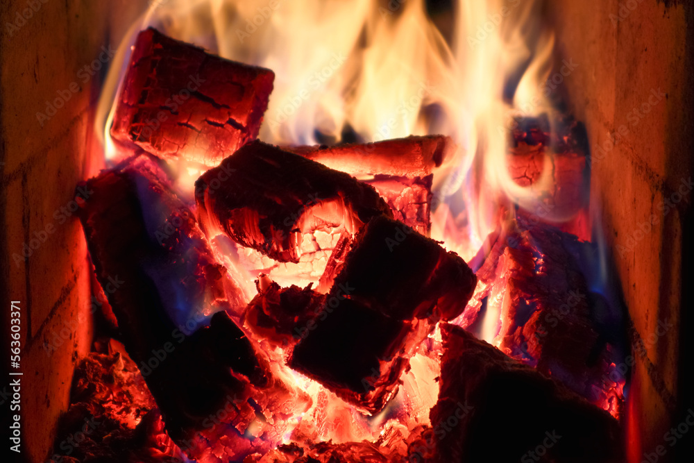 fire burns in the fireplace. Fireplace with flame fire ashes. burning ...