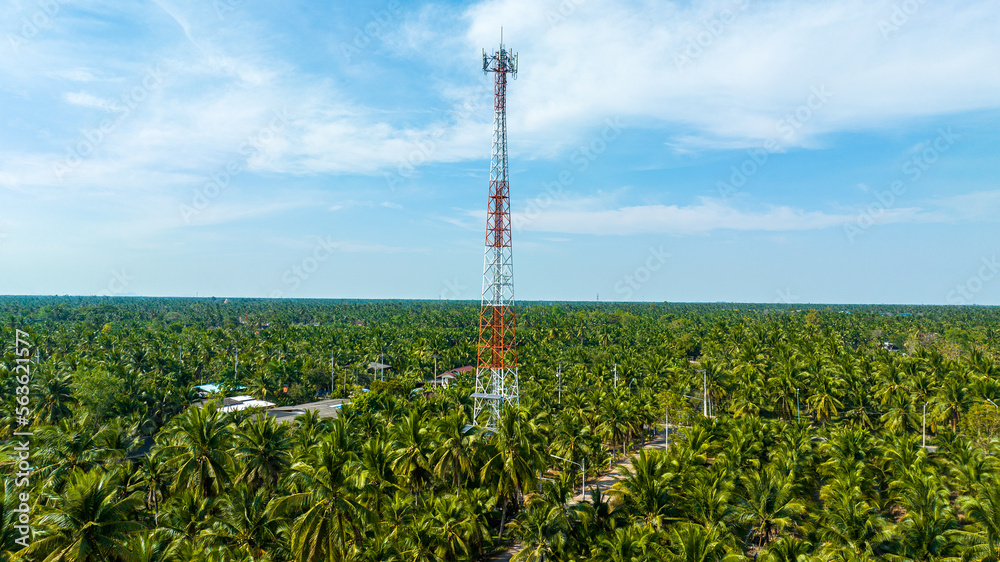 Aerial image of a 4G and 5G Telecommunication tower with radio antennas ...