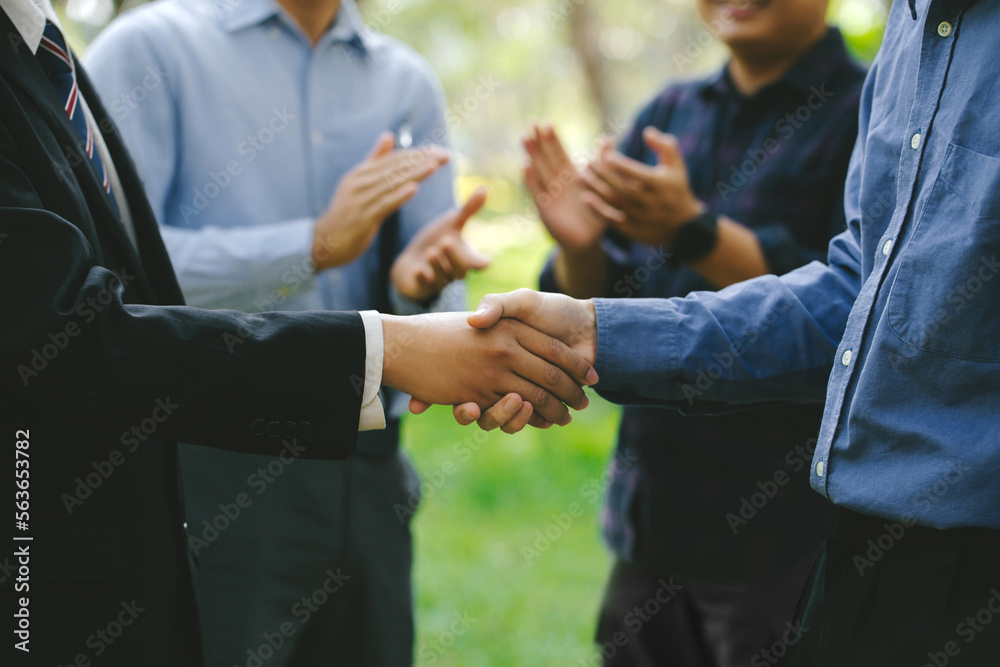 Businessmen Shaking hands for Collaboration of citizens, organizations ...