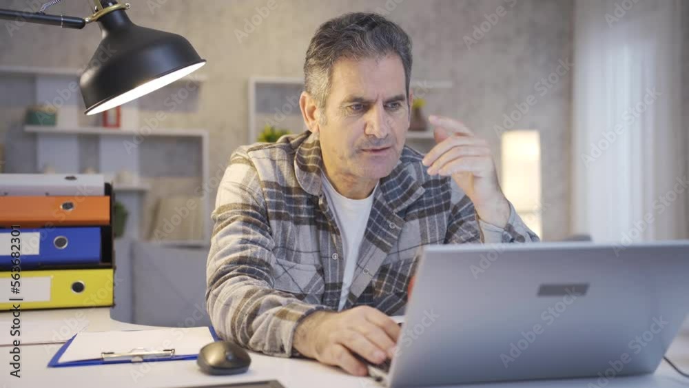 Stressed and frustrated home office worker mature man. Mature home ...