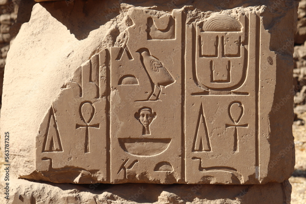 Ancient egyptian hieroglyphs carved on walls of Karnak temple in Luxor ...