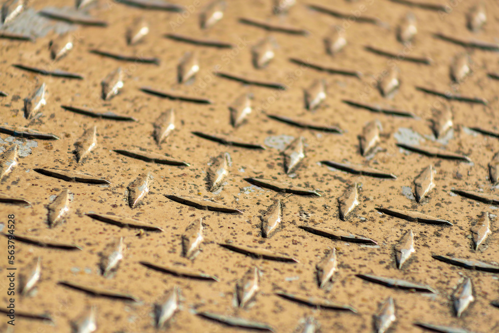 Industrial metal texture on metal walkway or manhole cover with ridged ...