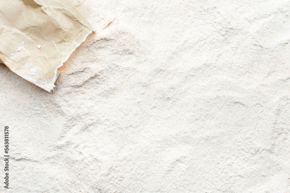 Background with flour. Paper bag and flour, flat lay, top view. Stock ...