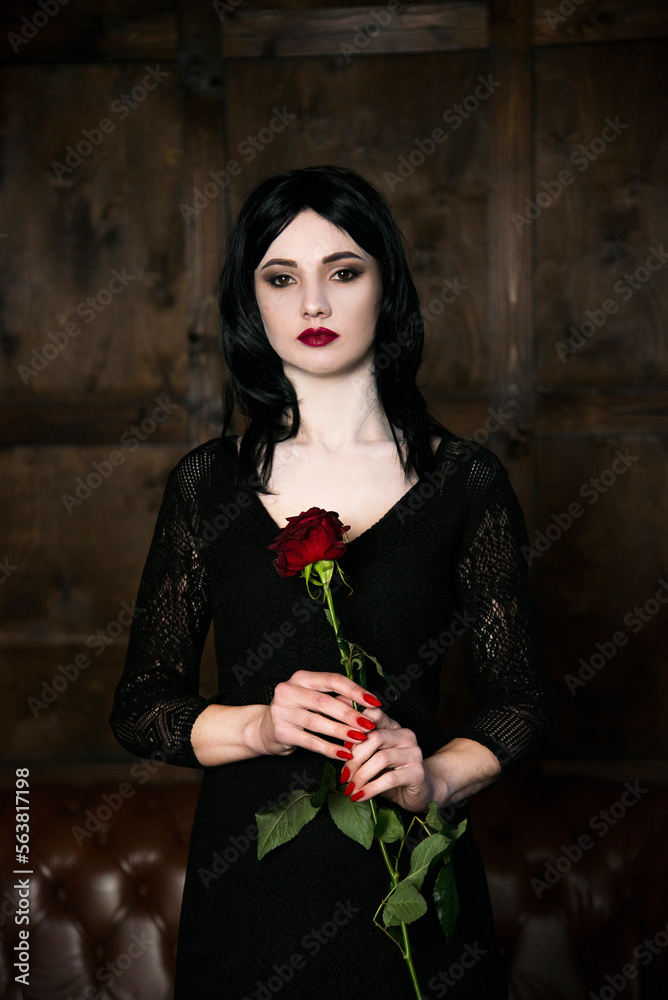 beautiful brunette girl cosplay morticia addams with red lips and nails ...