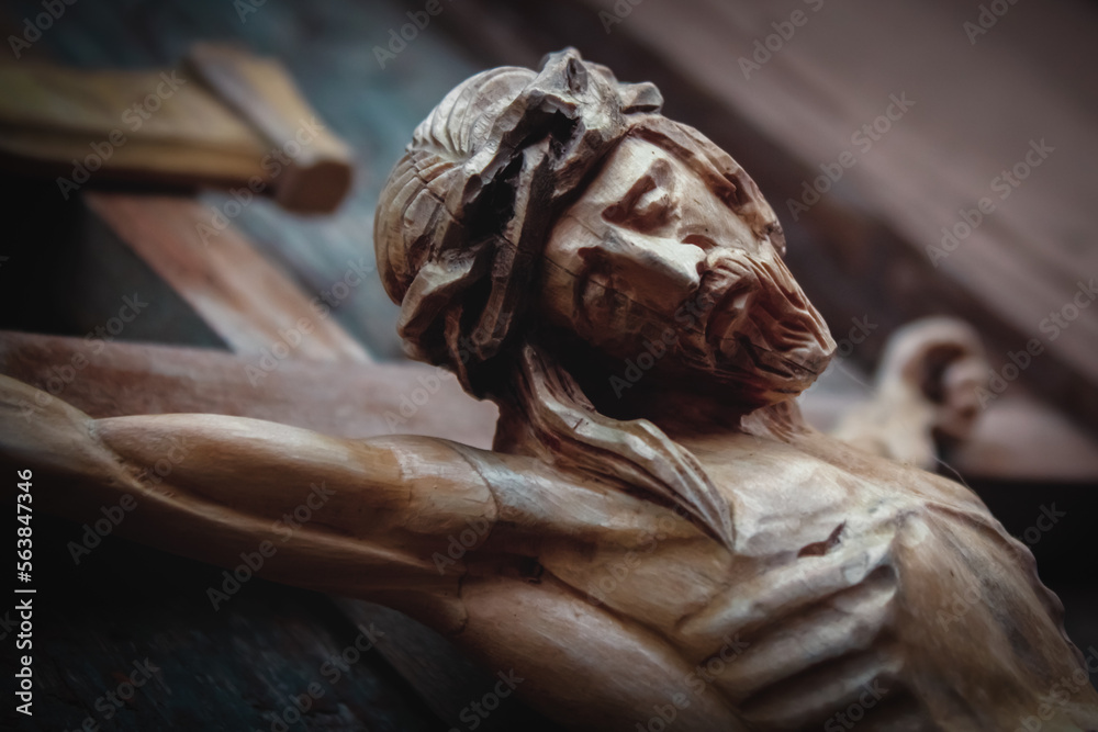 Jesus Christ crucified. Close up an ancient wooden statue. Horizontal image Stock Photo | Adobe ...