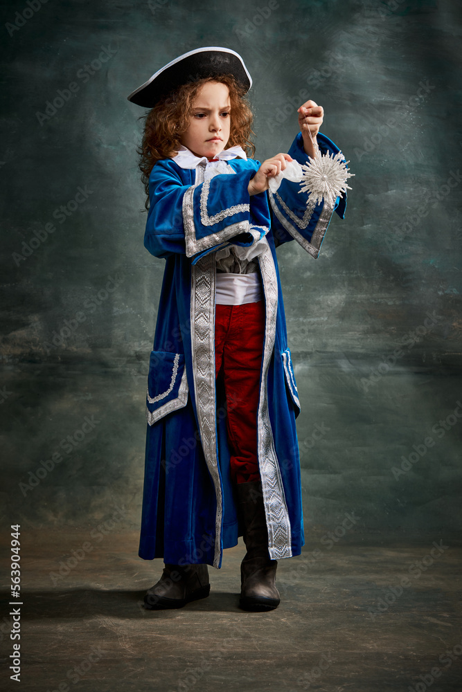 Cinematic portair of beautiful little girl dressed up as medieval ...