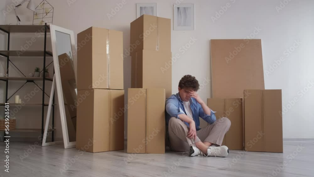 Rental home. Sad man. Moving new house. Upset guy feeling regret ...