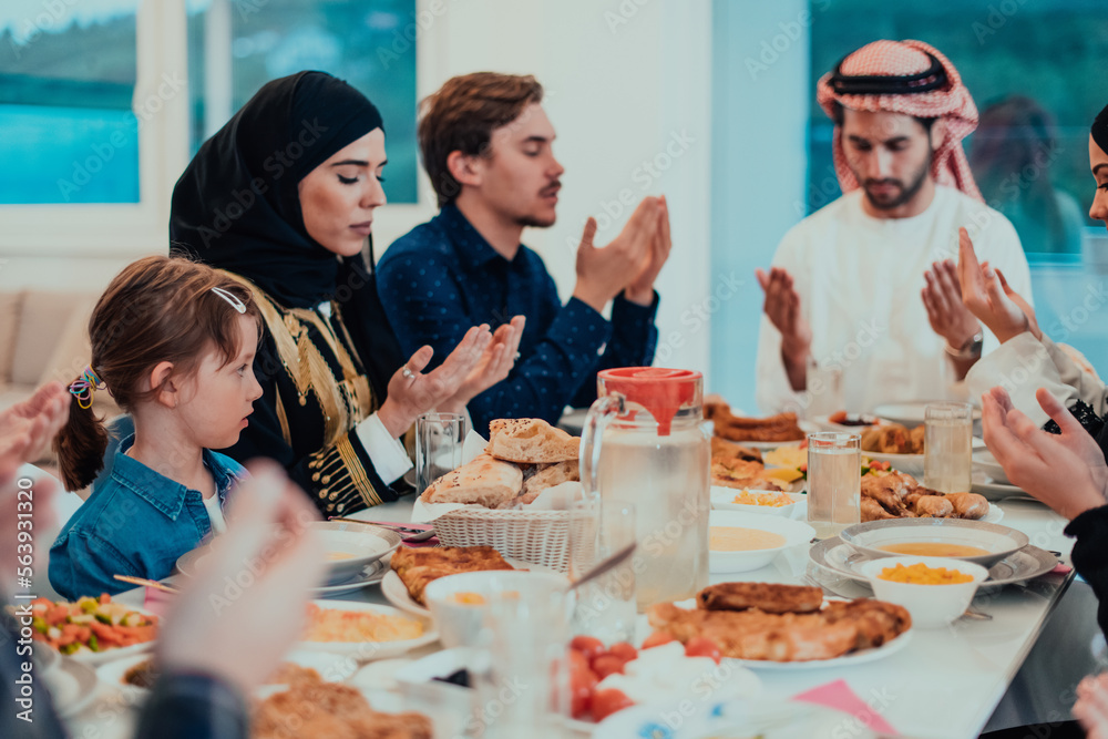 Muslim Family Praying Together