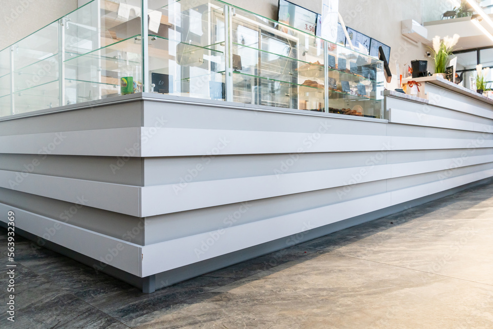 The interior of a modern cafe with a modern bar counter and a counter ...