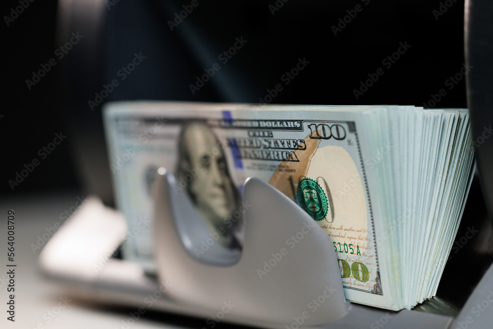 Close up of electronic cash counting machine. Counting money on bank ...