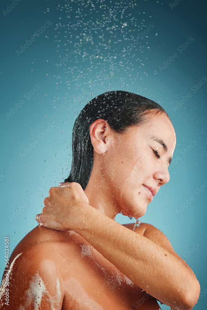 Water splash, cleaning and shower of a young model woman holding her ...