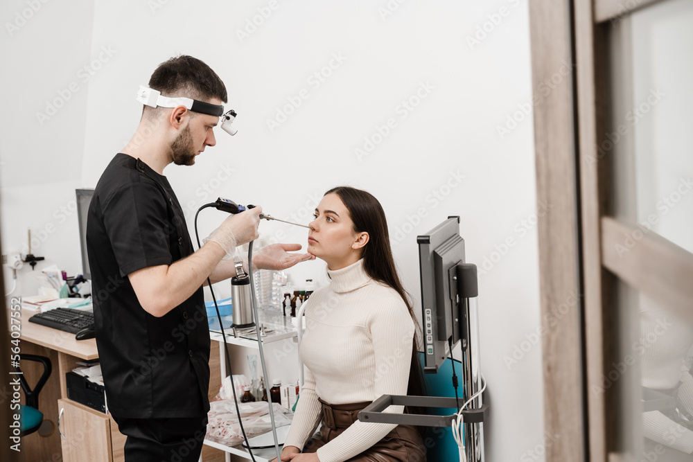 Nose endoscopy. Rhinoscopy procedure with rhinoscope. ENT doctor ...
