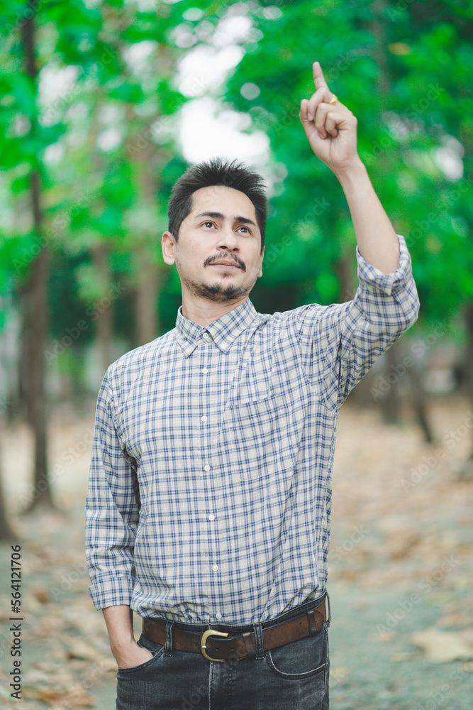 Young Muslim Raising the index finger for Tauhid symbol in islam on ...