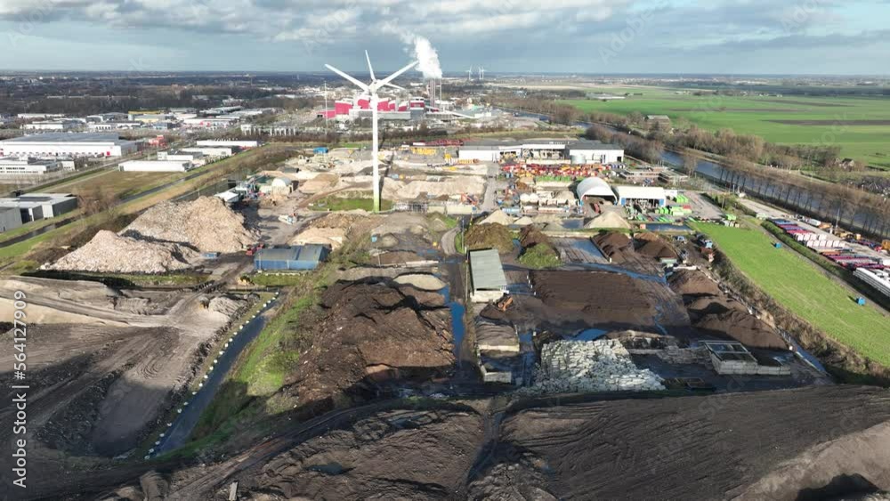 Landfill waste is buried in layers and compacted under controlled ...