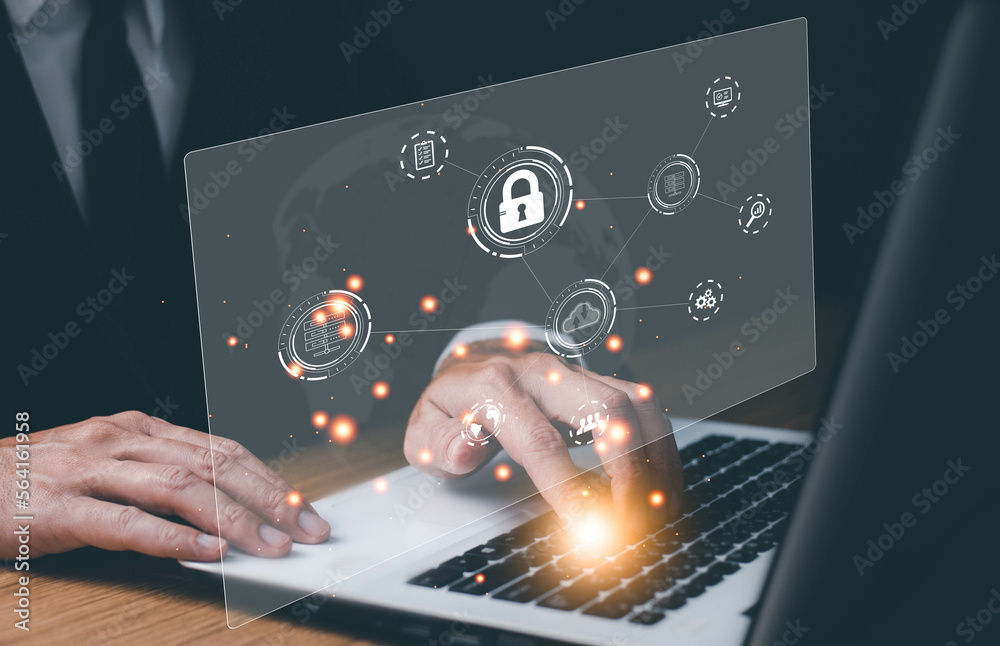 Businessman typing on keyboard laptop computer to input username and ...