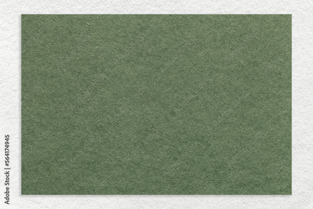 Texture of craft green color paper background with white border, macro ...