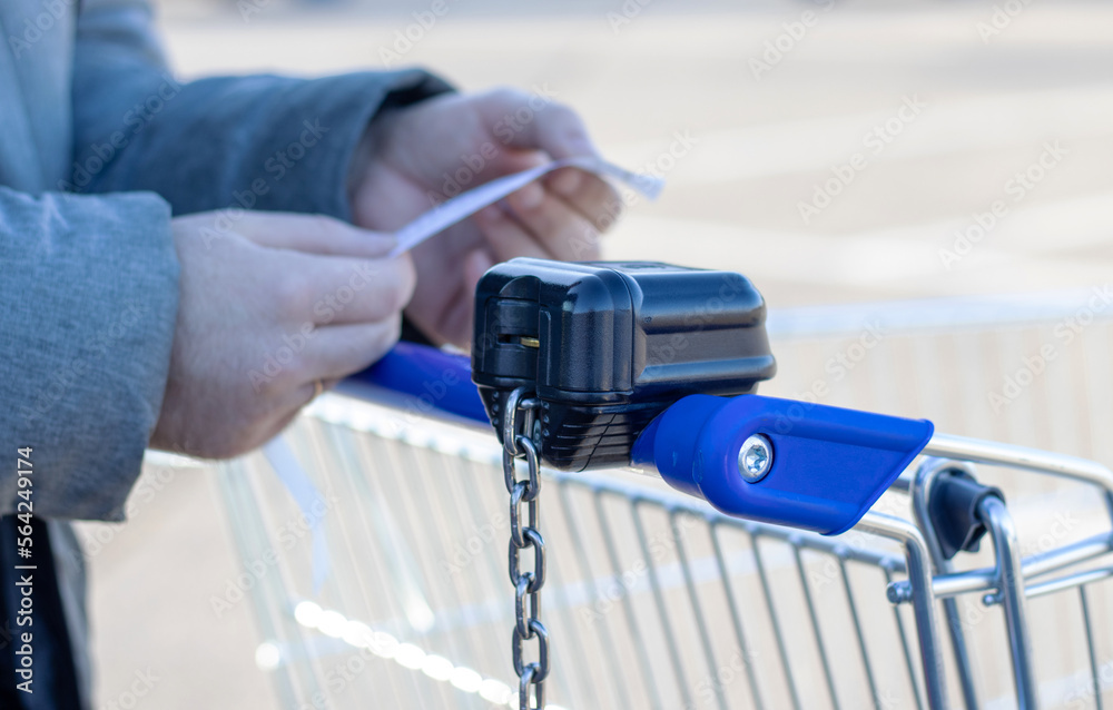 many trolley shopping cart with coin lock anti theft system outside in ...