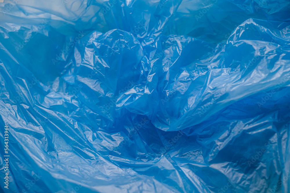Texture and background of a blue plastic bag. Blue disposable plastic ...