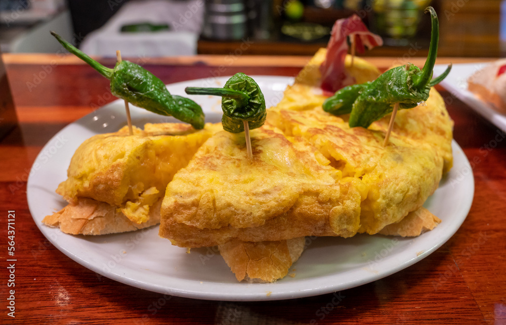 Typical snack of Basque Country, pinchos or pinxtos, small piece of ...