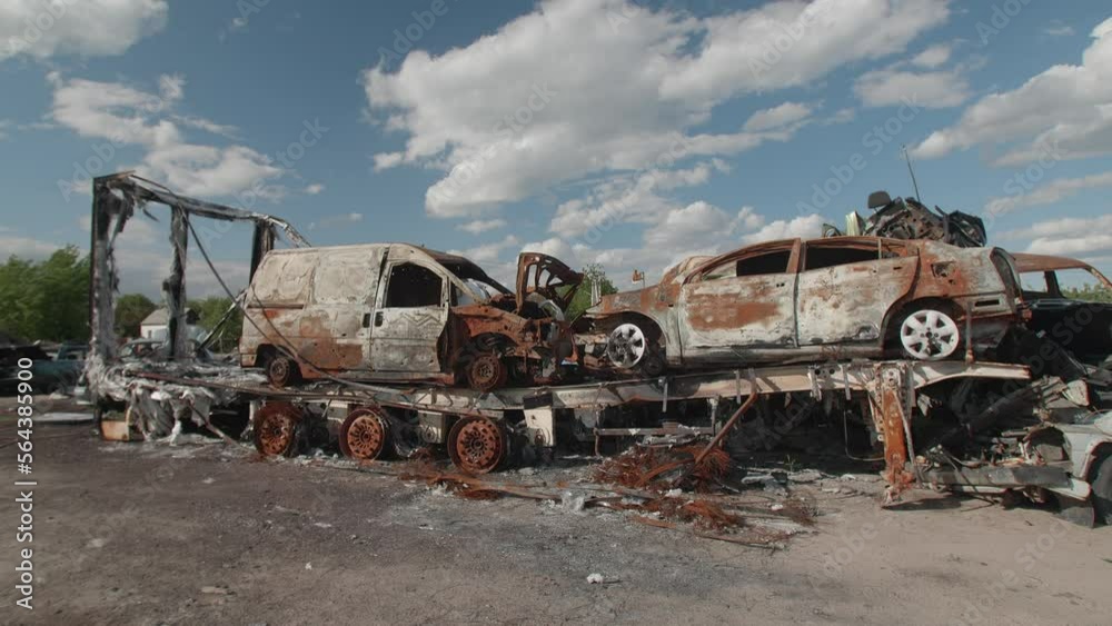 March, 2022. Bucha, Ukraine. Apocalyptic scene of car graveyard with ...