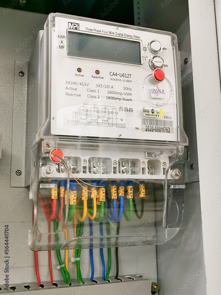 Image of digital kilowatt hour meter mounted in electrical cabinet ...