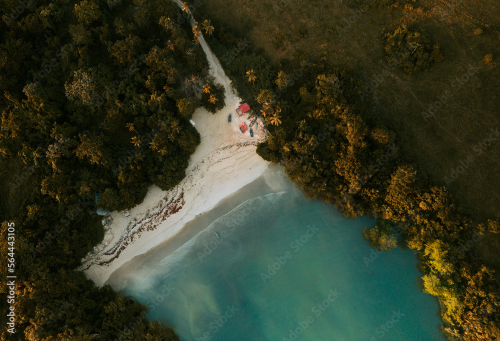 This photo shows a stunning view from the top of a beach. The beach is ...