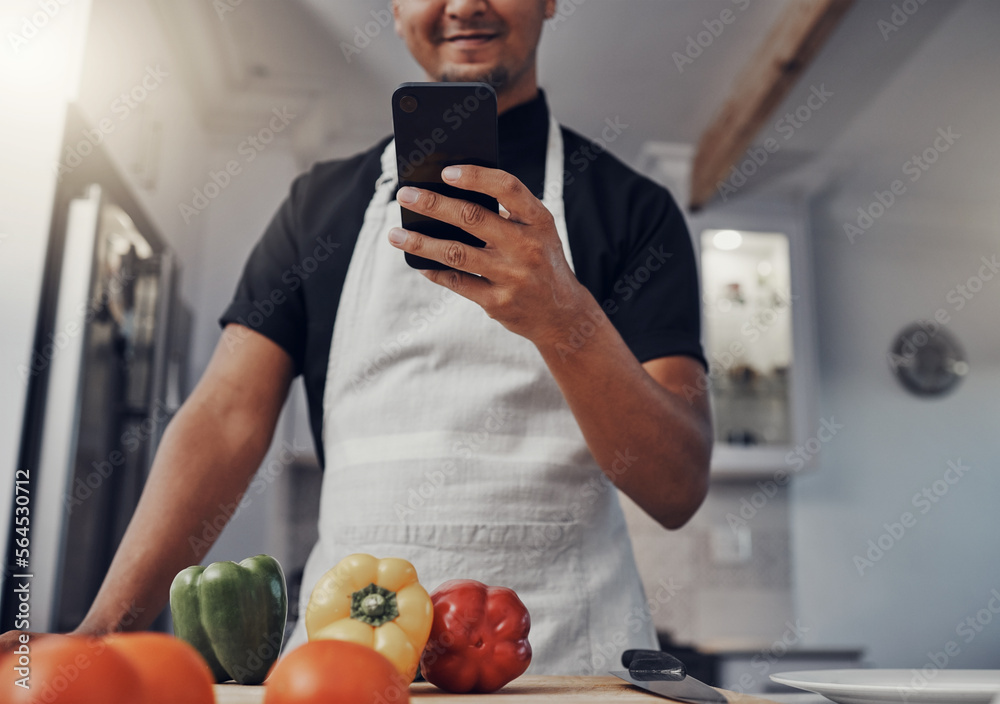 Cooking vegetables, phone and man in kitchen while online with house ...