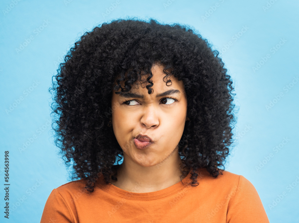 Thinking, confused and black woman in studio for emoji, contemplating and thought on blue ...