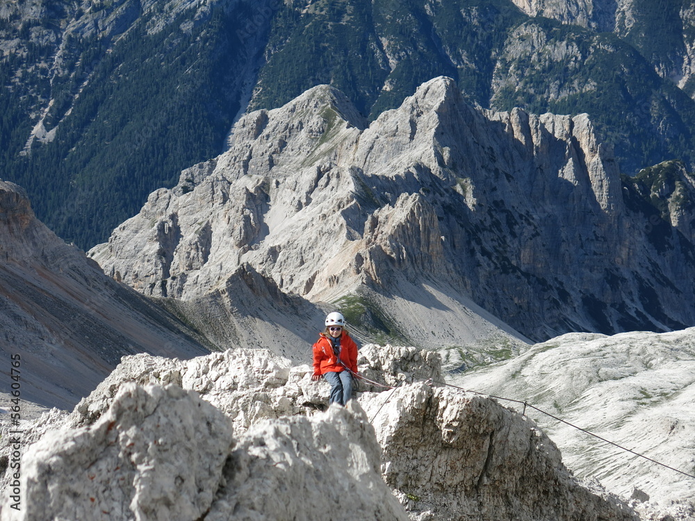Little girl going ferrates in Dolomite Alps in Italy. What a beautiful ...
