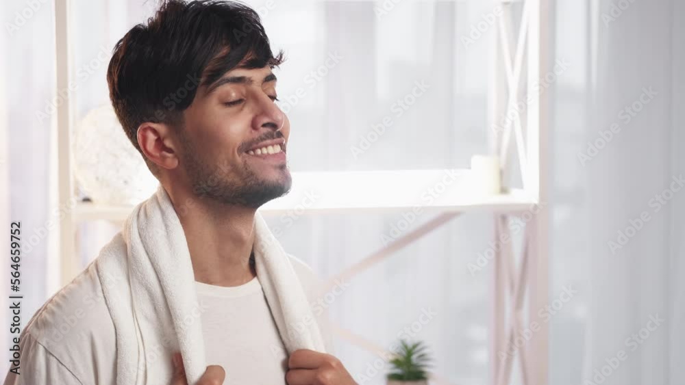 Morning freshness. Man hygiene. Spa therapy. Relaxed satisfied smiling ...