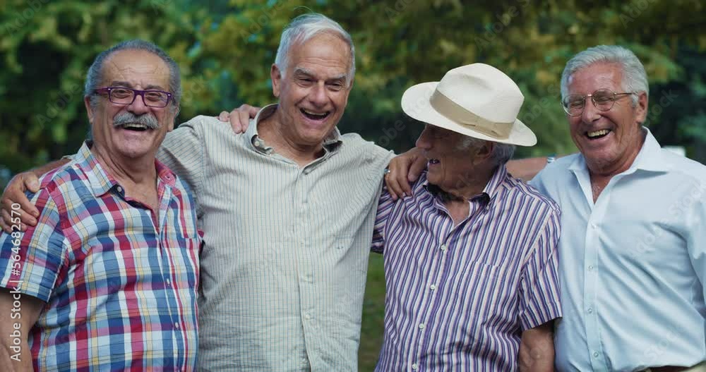 Portrait of a Group of Smiling and Active Senior Men Looking at the ...