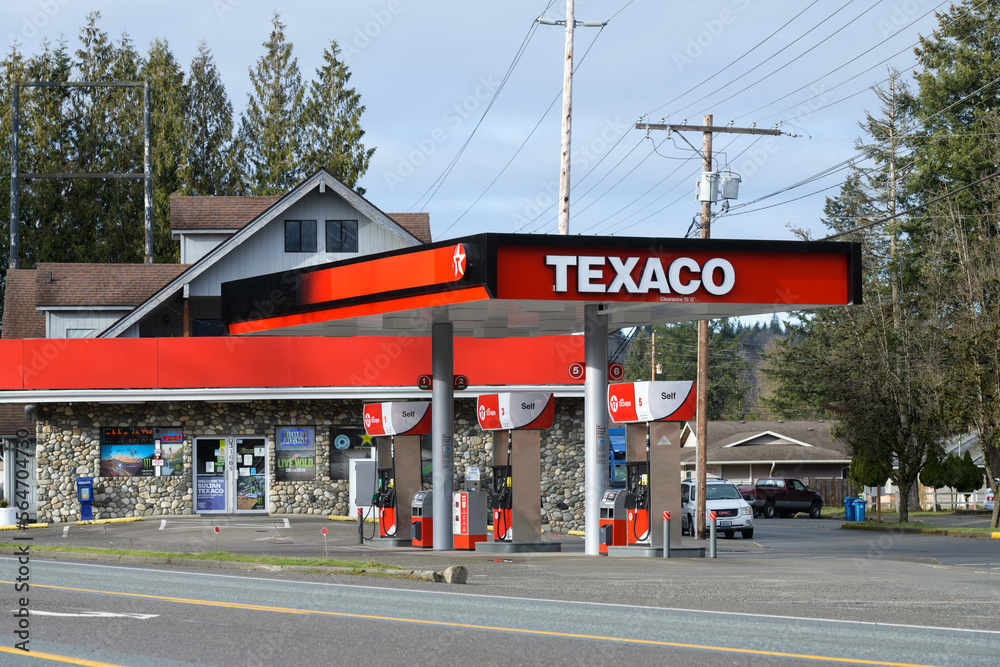 Sultan, WA, USA - January 16, 2023; Texaco gas station with self serve ...