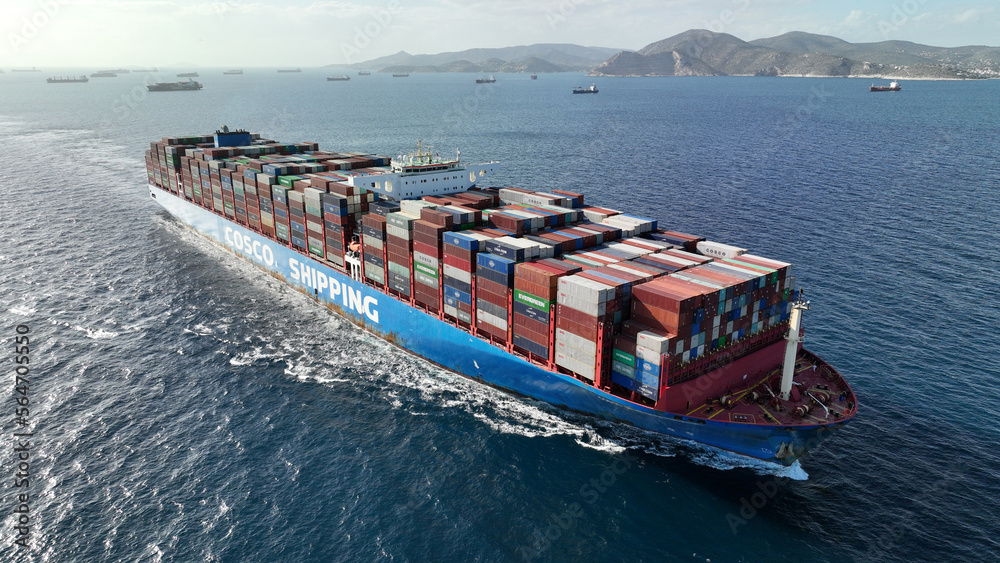 Aerial drone ultra wide photo of COSCO truck size container ship ...
