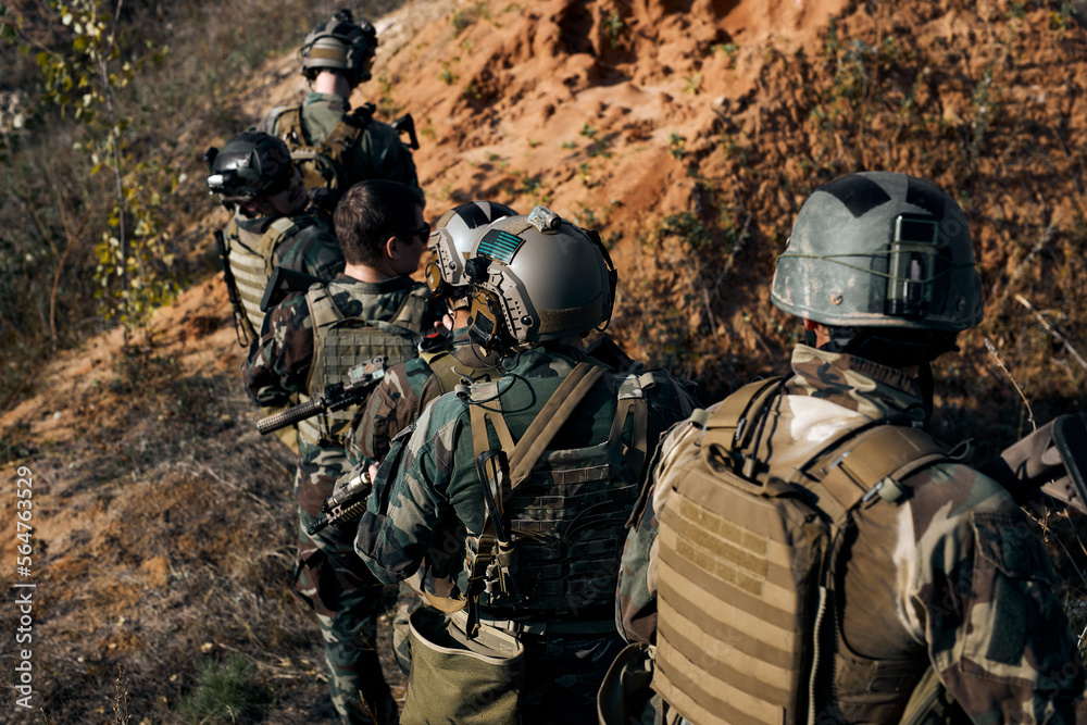 Team of military people during the operation against enemy, soldiers ...