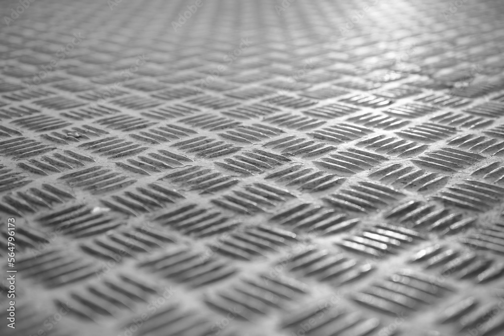 Metallic aluminum background with texture detail of a slip metal floor ...