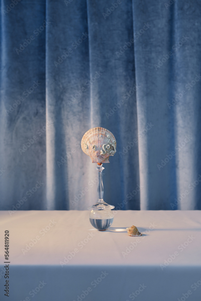 Abstract balancing composition of broken glass, ball and shell Stock ...