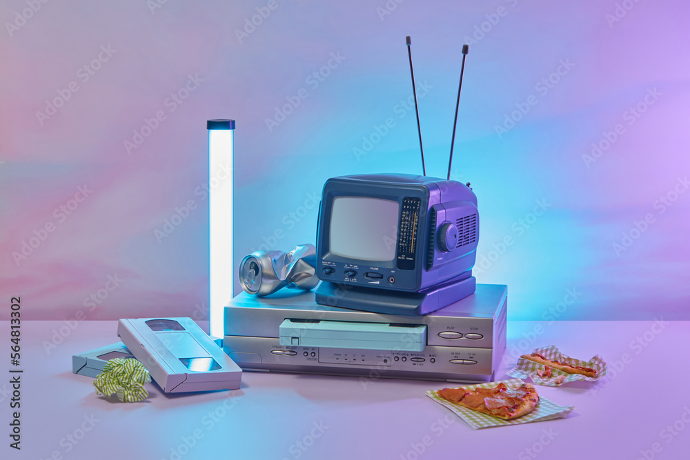 Old TV and VCR player with old VHS cassettes. Stock Photo | Adobe Stock