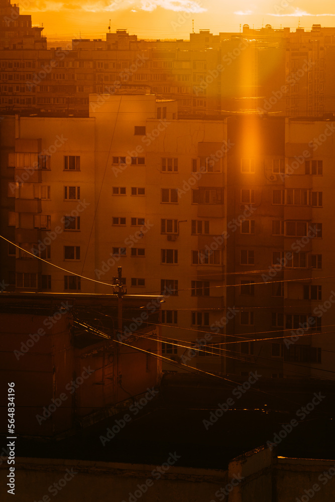 Facades of panel high-rise buildings at sunset. Stock Photo | Adobe Stock