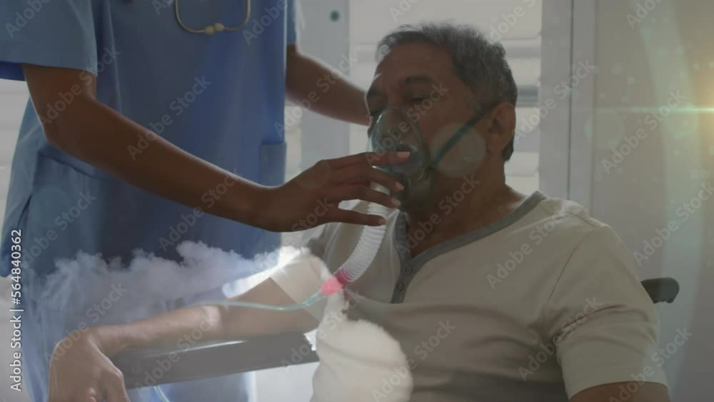 Animation of light trails and smoke over diverse doctor and patient ...