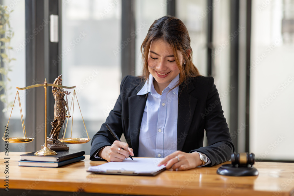 Business Asian woman in suit and Lawyer working on a documents at ...