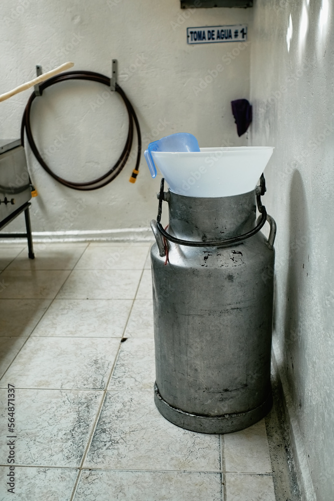 Old milk container Stock Photo | Adobe Stock