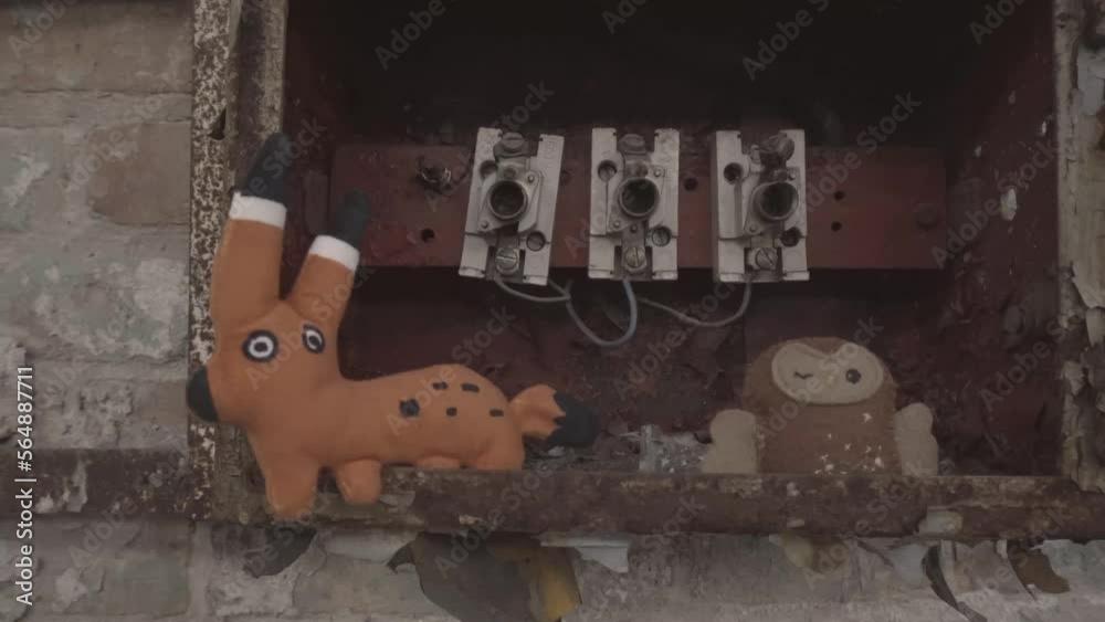 Plush toys resting in an abandoned industrial decay setting Stock ビデオ ...