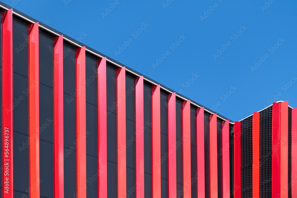 Red abstract detail of modern industrial building facade Stock Photo ...