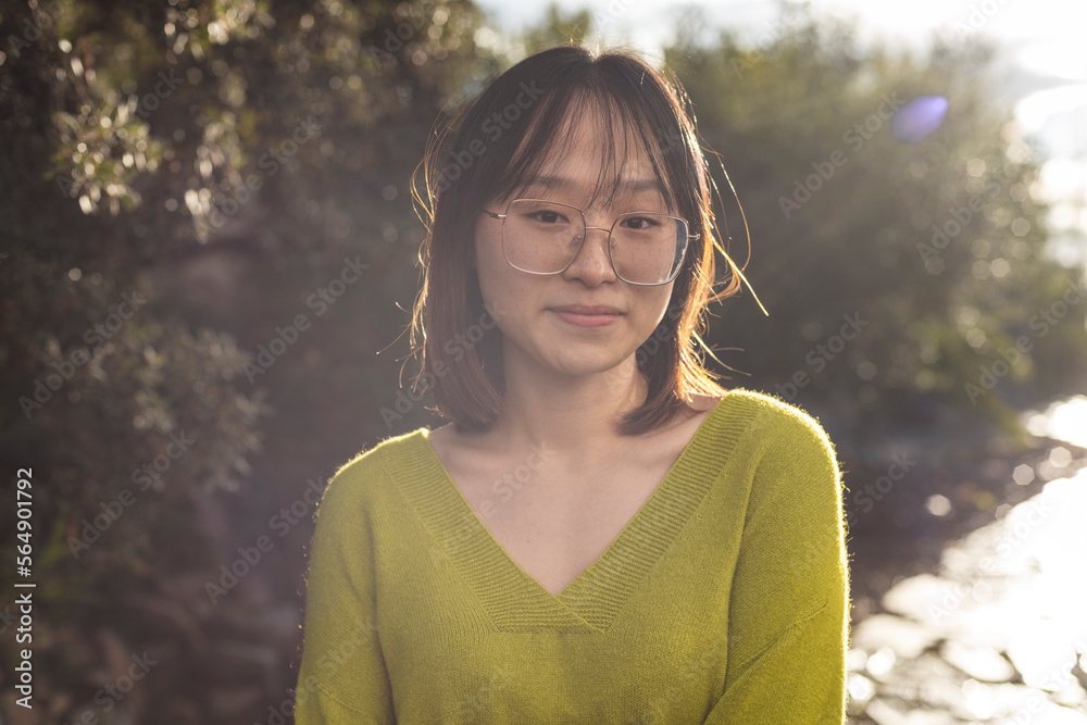 Self-confident chinese woman with glasses Stock Photo | Adobe Stock