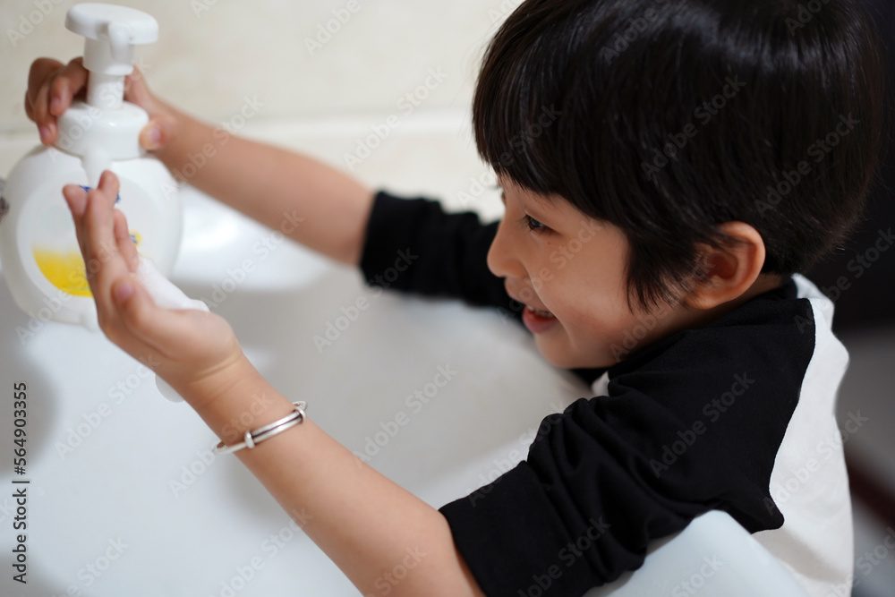 Asian little boy, washing hands in bathroom at home Stock Photo | Adobe ...