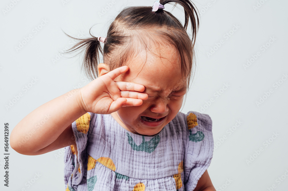 Cute toddler girl crying Stock Photo | Adobe Stock
