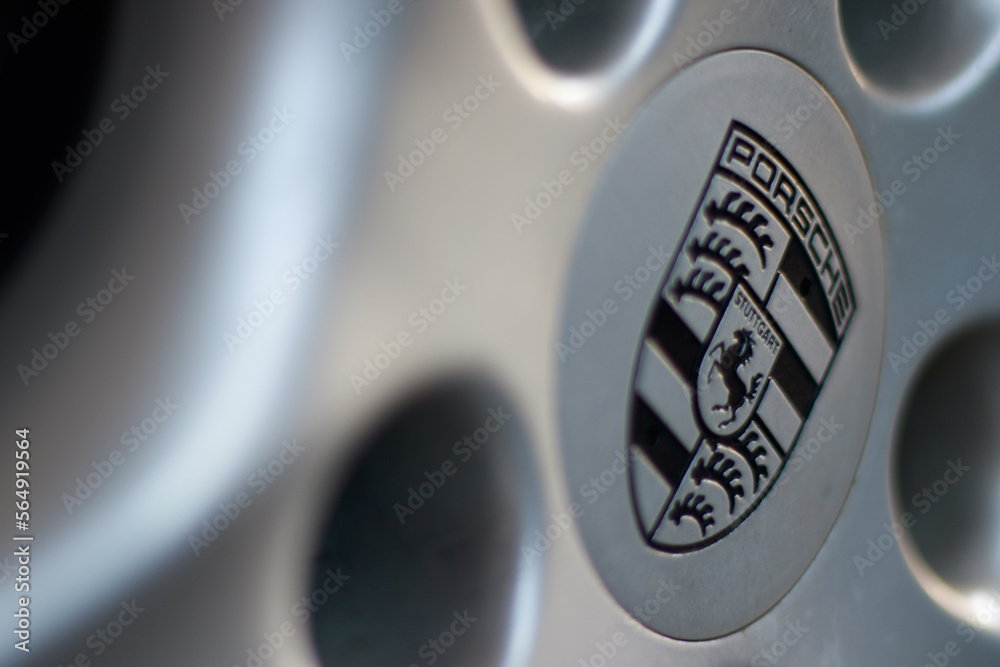 Porsche logo on mag wheel Stock Photo | Adobe Stock